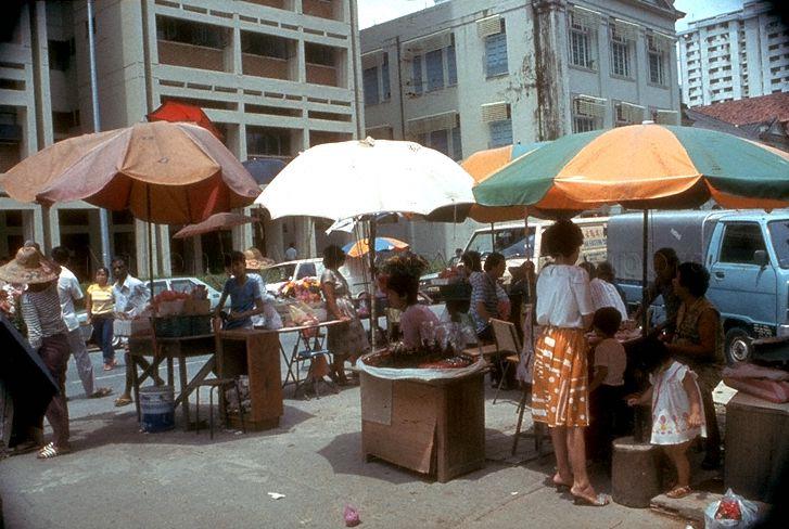 Roadside makeshift stalls in front of Kuan Im Thong Hood Cho