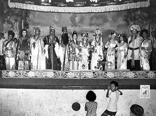 TEOCHEW OPERA PERFORMERS APPEARING ON STAGE DURING A