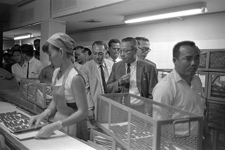 Minister for Finance Lim Kim San (second from right) and
