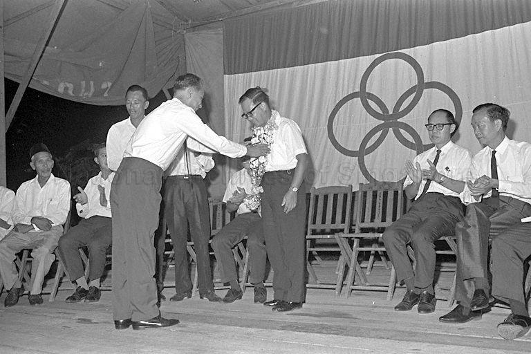 Deputy Prime Minister Dr Toh Chin Chye being garlanded