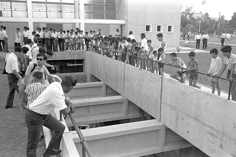 Members of the public viewing the Braddell-Bartley Road