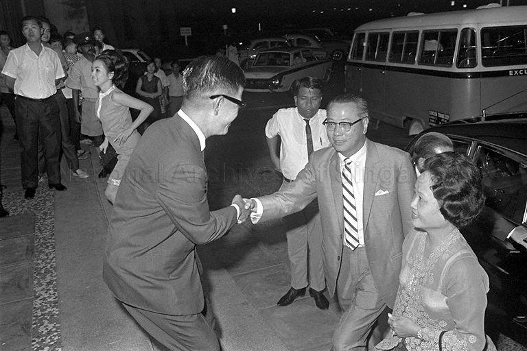 Minister for Finance Lim Kim San and his wife arriving at