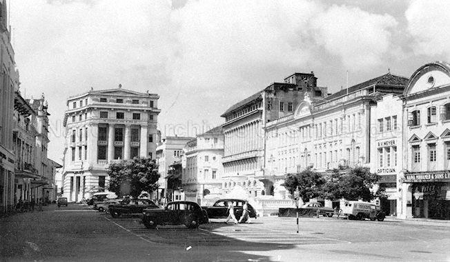 View of Raffles Place with Robinsons on the right and