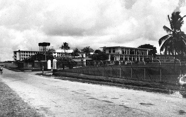 Entrance to camp showing station headquarters at RAF (Royal