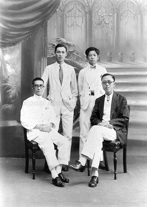 STUDIO PHOTOGRAPH OF FOUR YOUNG CHINESE MEN