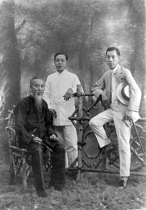 STUDIO PHOTOGRAPH OF THREE CHINESE MEN