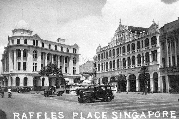 View of Raffles Place with Chartered Bank building on the