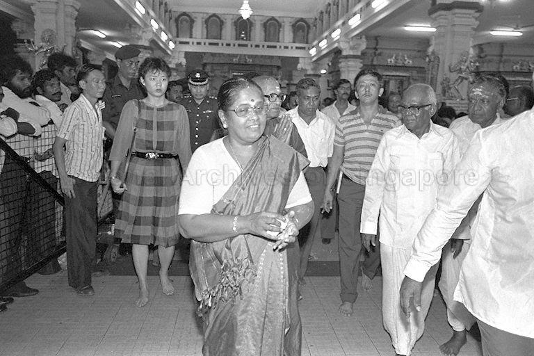 President C V Devan Nair (centre, face partially covered)