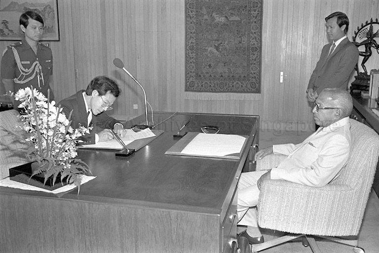 President C V Devan Nair (seated right) officiating at the