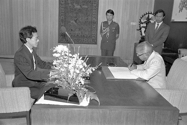 President C V Devan Nair (seated right) officiating at the