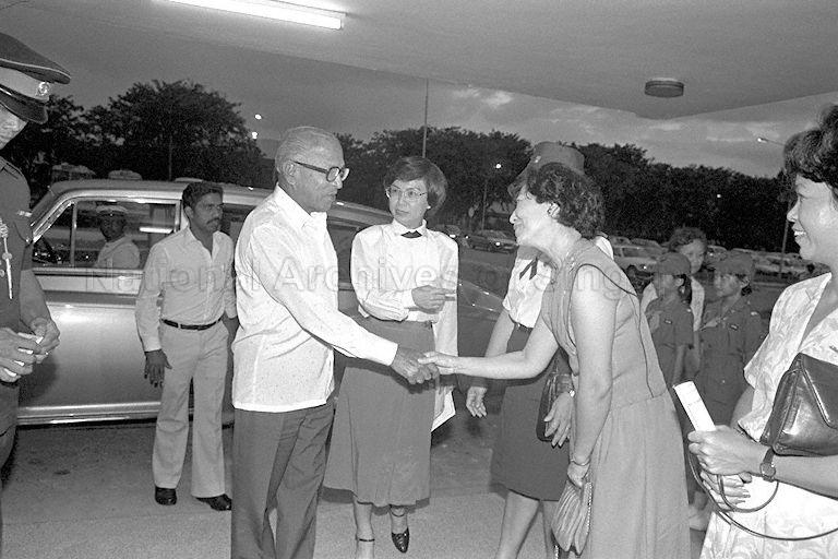 President Devan Nair shaking hands with a member of the