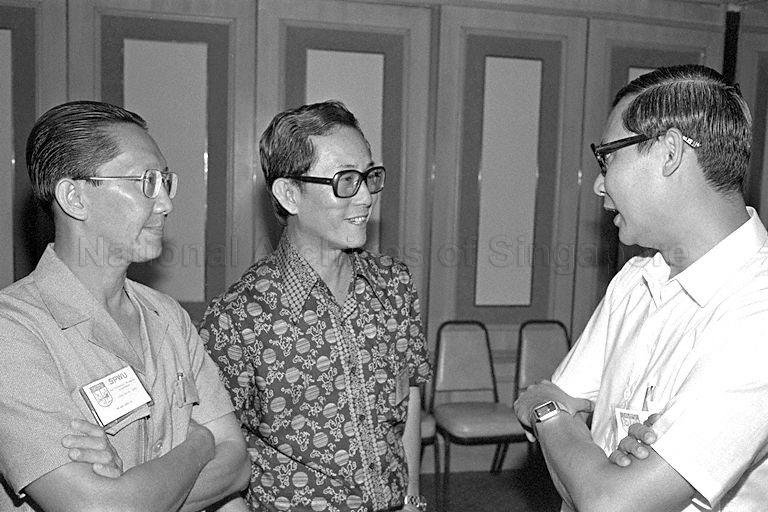 Political Secretary to the Prime Minister Ng Pock Too (right