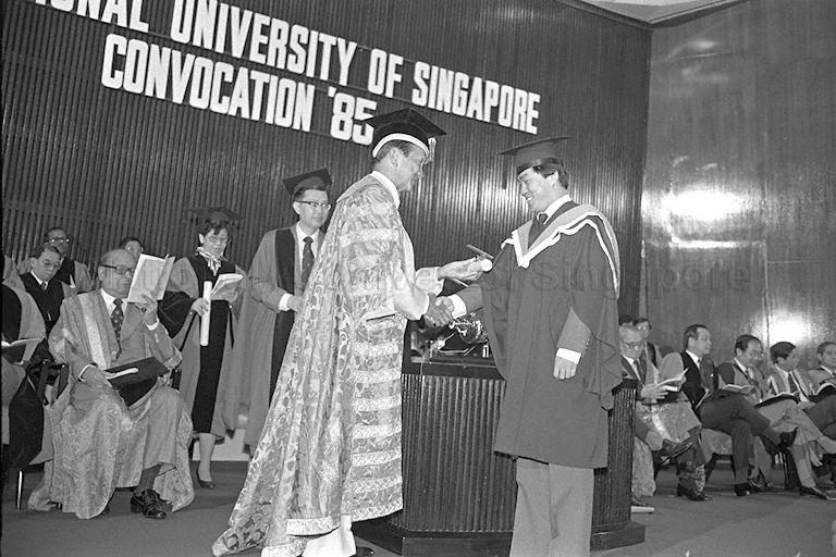 President Wee Kim Wee awarding degree to graduand at the