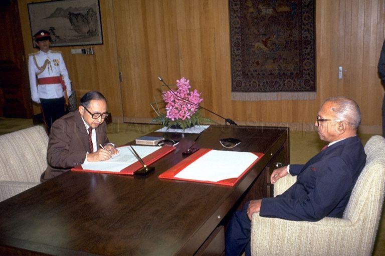 PRESIDENT C V DEVAN NAIR (RIGHT) WITNESSING THE MINISTER FOR