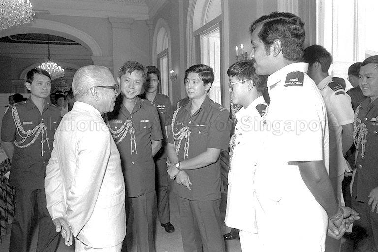 President Devan Nair speaking with newly appointed honorary