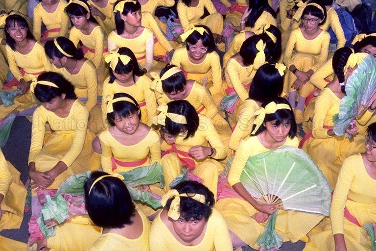 Participants of a fan dance performance at opening ceremony