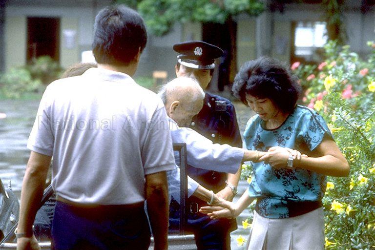 1998 General Election - Elderly lady being escorted to Holy