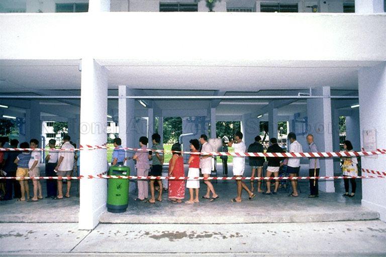 1998 General Election - People lining up to vote at polling