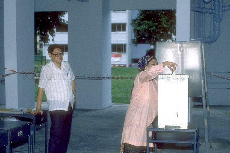 1998 General Election - Voter slipping ballot card into
