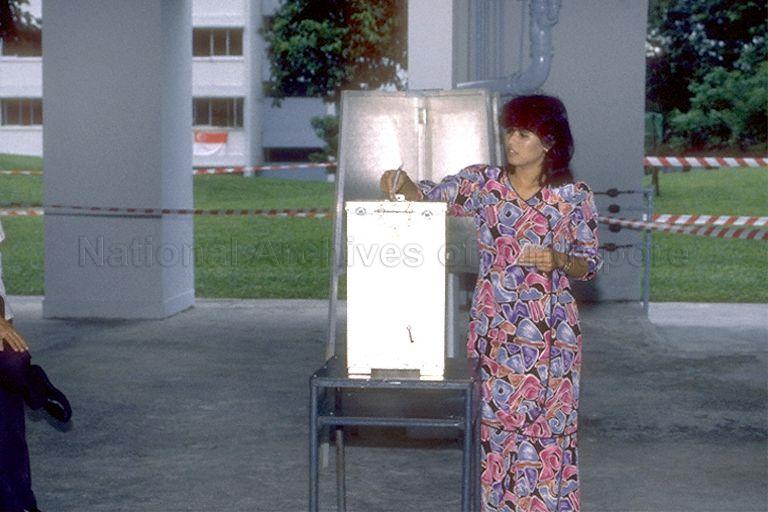 1998 General Election - Voter slipping ballot card into