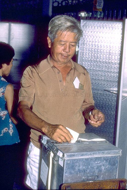 1998 General Election - Voter places his ballot slip into