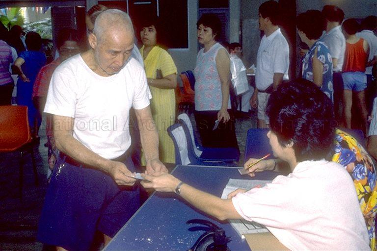 1998 General Election - Gentleman registering to vote at