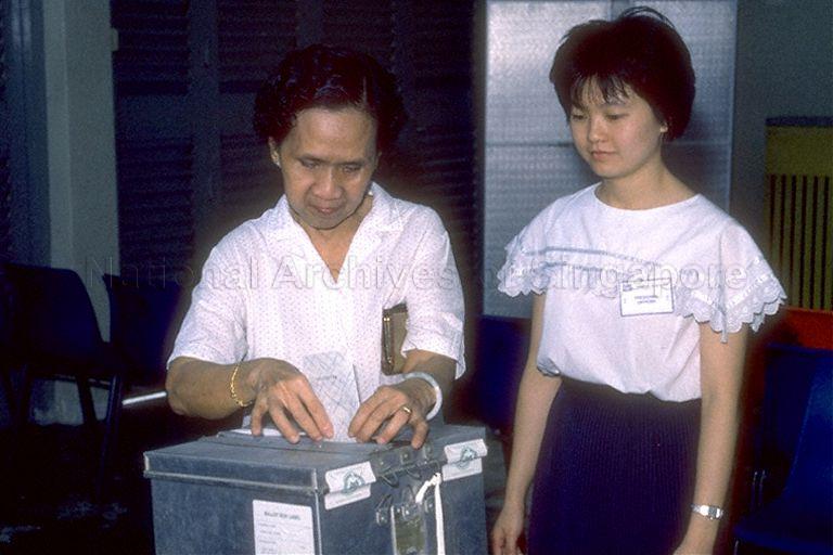 1998 General Election - Voter slipping ballot card into