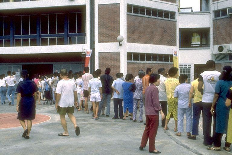 1998 General Election - People lining up to vote at polling