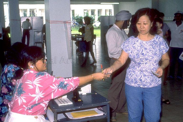 1998 General Election - Lady registering to vote at polling