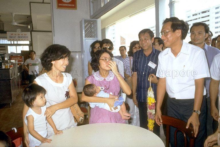 Minister without Portfolio Lim Chee Onn (right) in