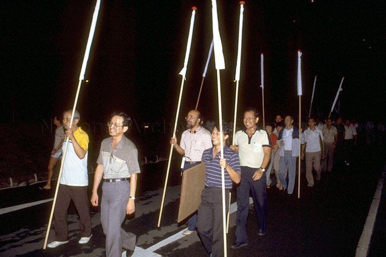 General Election 1984 - Party supporters carrying flags en