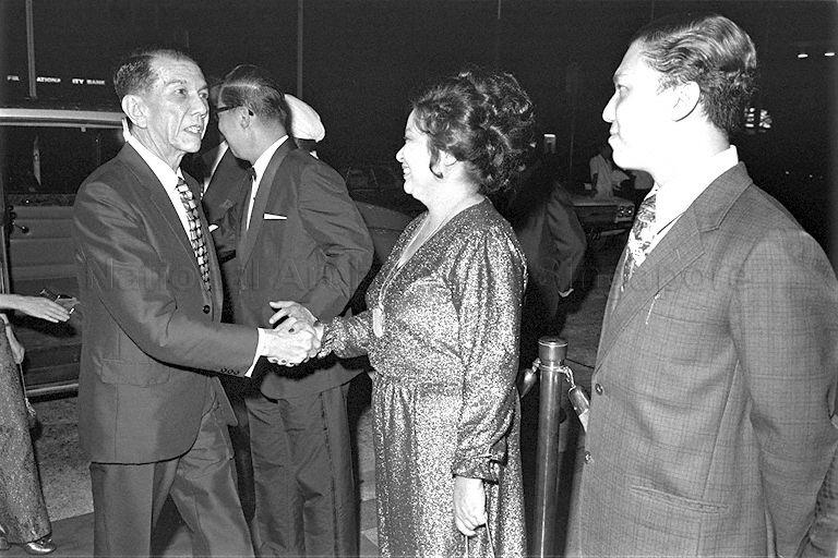 President Dr Benjamin Sheares participates in a receiving