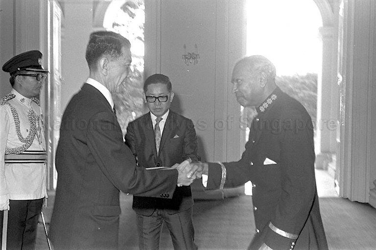 President Dr Benjamin Sheares congratulating High