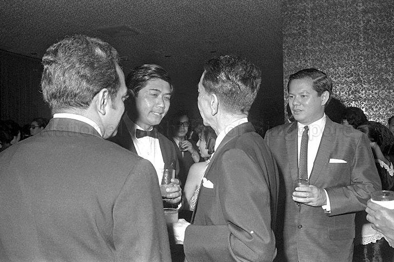 President Dr Benjamin Henry Sheares (right, back to camera)