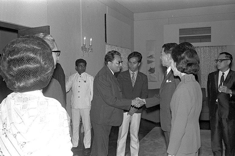 President Dr Benjamin Sheares greeting a guest during a