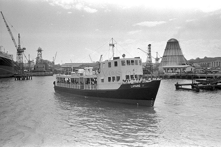 Picture of a ship sailing along the waters of Sentosa. This