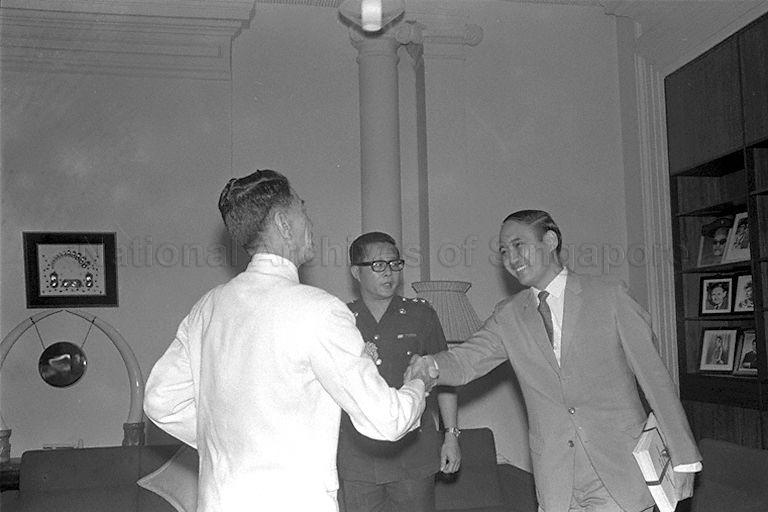 President Dr Benjamin Henry Sheares (back to camera)