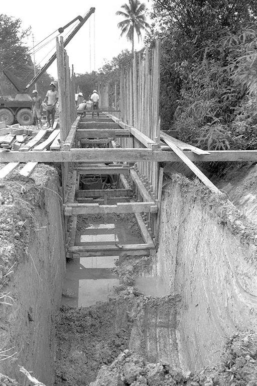 View of a cut-and-fill, timber-braced trench for the
