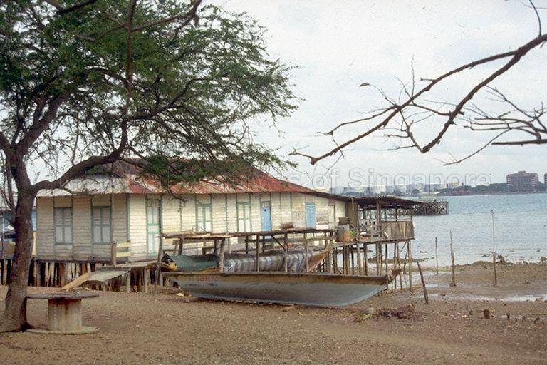 PULAU SAKENG - ZINC ROOFED HOUSES AND FISHING BOAT