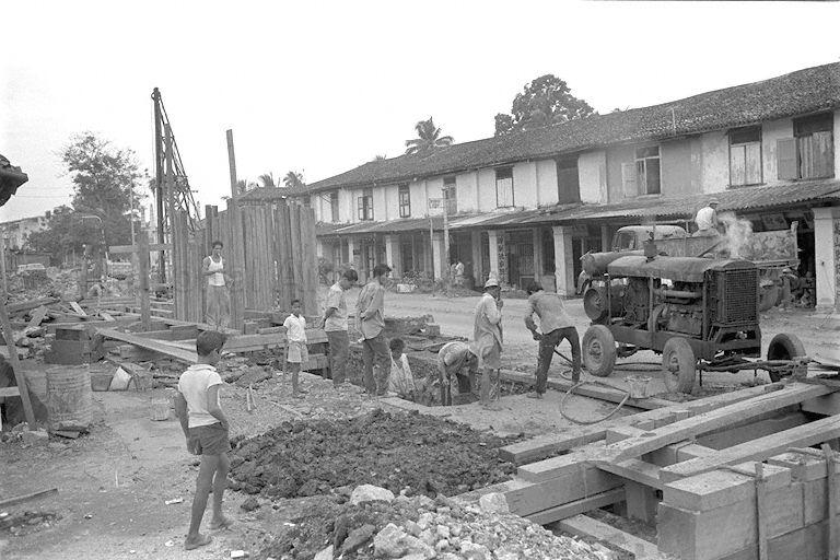 Public Works Department (PWD) workers constructing what is