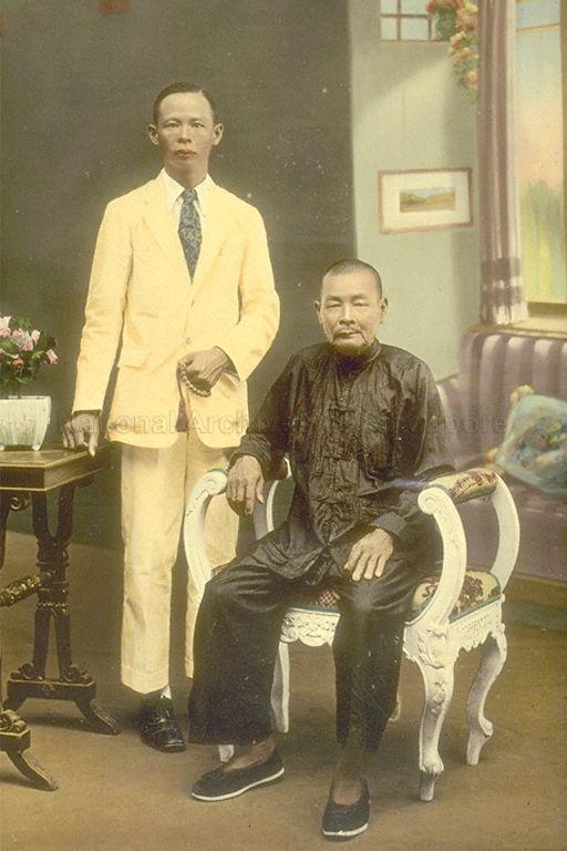 GROUP PHOTOGRAPH OF TWO CHINESE GENTLEMEN IN STUDIO (C1920)