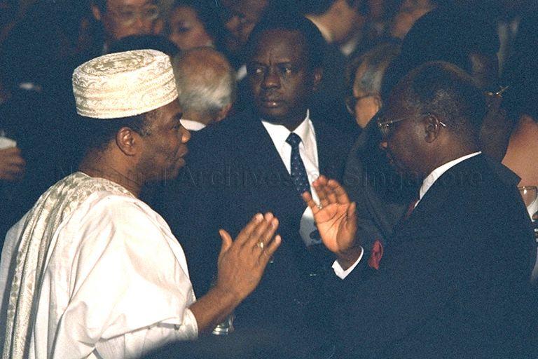 President of Sierra Leone Dr Joseph S Momoh (left) chatting