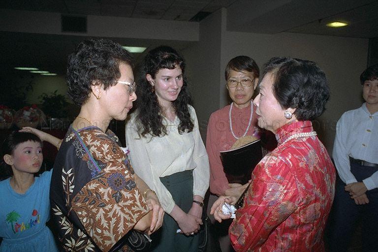 Mrs Wee Kim Wee (right), wife of President, with guests at