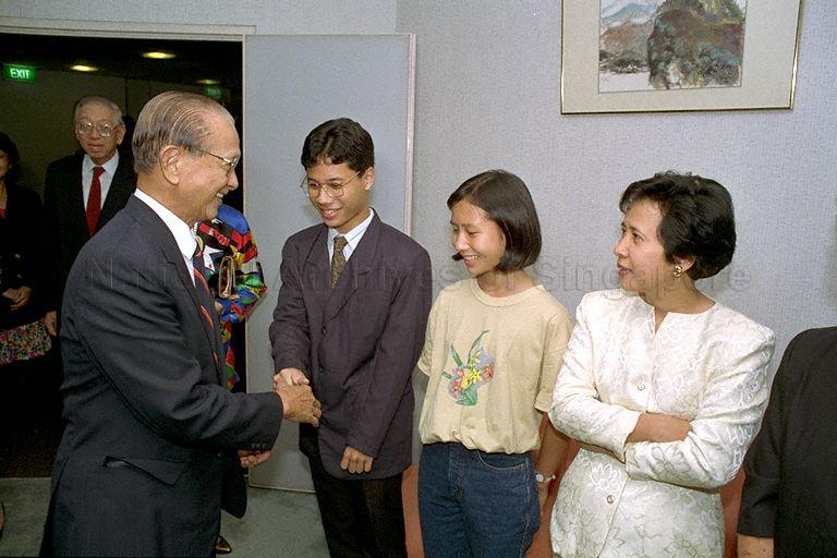President Wee Kim Wee going through a receiving line at the