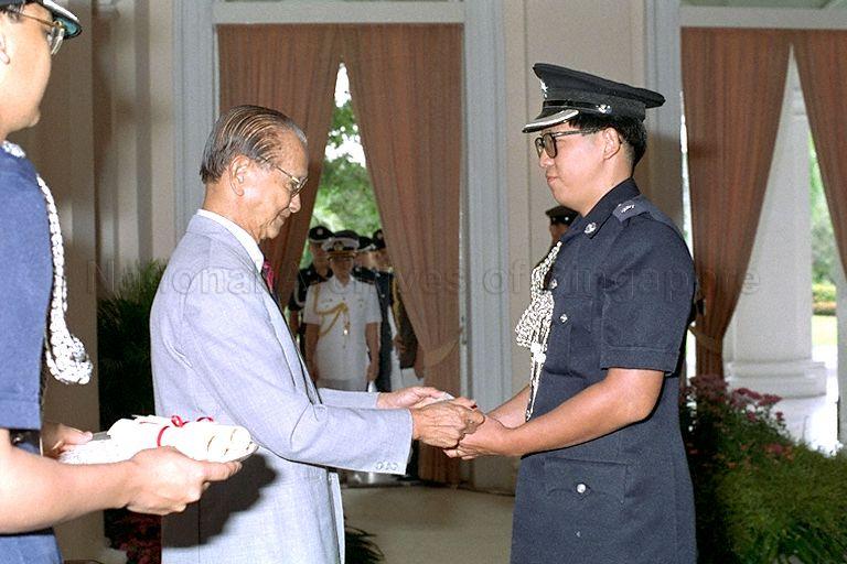 President Wee Kim Wee presenting certificates of appointment