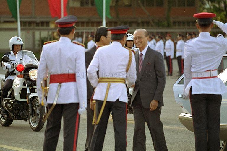 President Wee Kim Wee going through a receiving line as he
