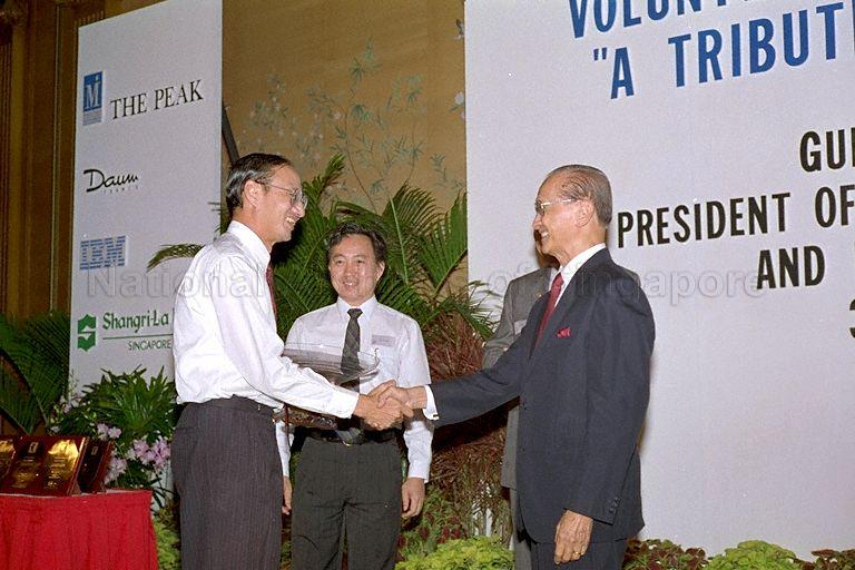 Executive Vice-President of DBS Bank, Ng Kee Choe, receiving