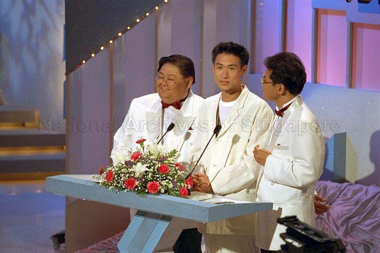 Show hosts Moses Lim and Jack Neo (shown from the side) with