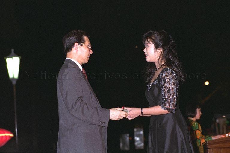 President's scholar Sim Ann receiving the President's