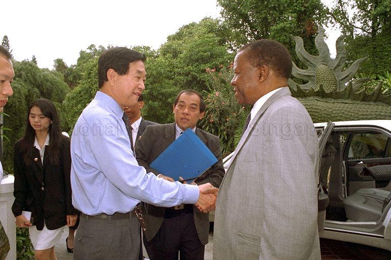 President of Botswana Sir Ketumile Masire being greeted by